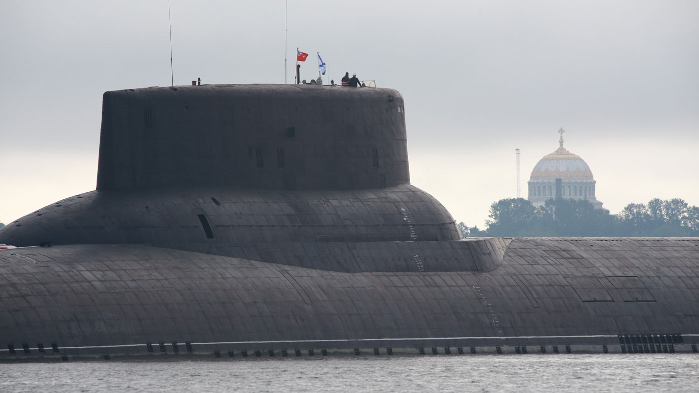UK news: Royal Navy submarine in near-miss with a passenger ferry