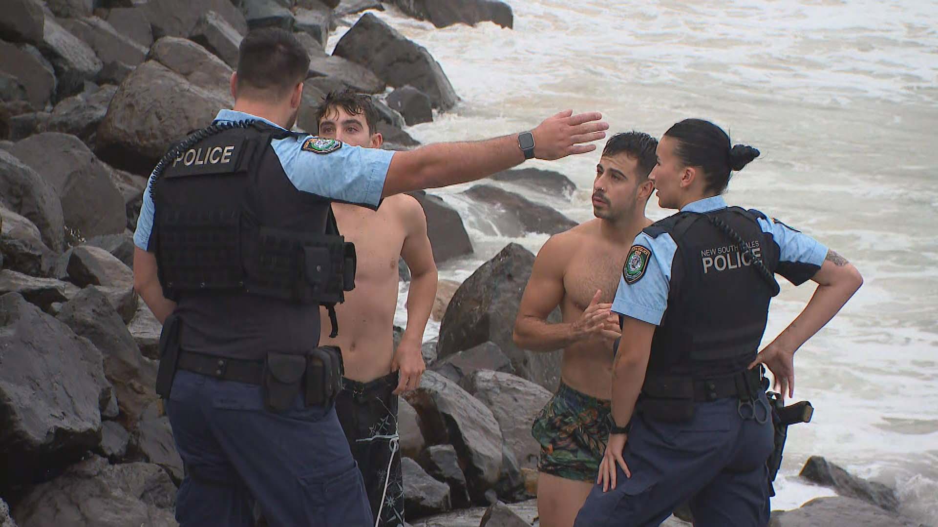 Police respond to backpackers choosing to swim as ex-Cyclone Alfred ...