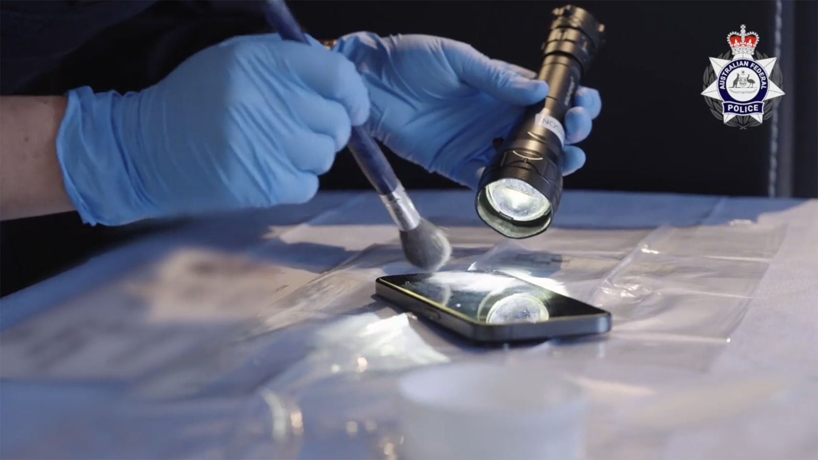 Major raids as AFP arrests alleged mastermind of secret ‘Ghost’ network ...