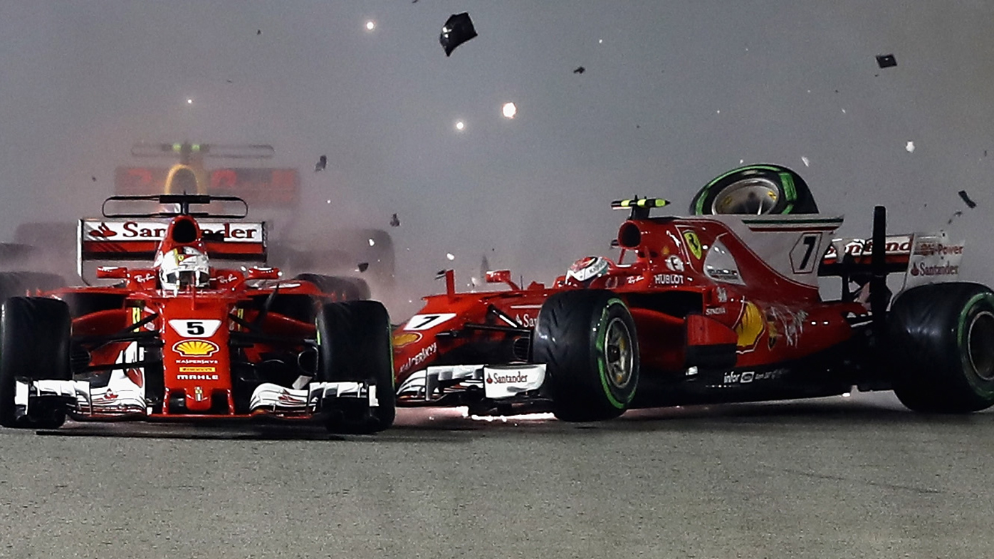 A crash between Ferrari teammates Sebastian Vettel and Kimi Raikkonen ...