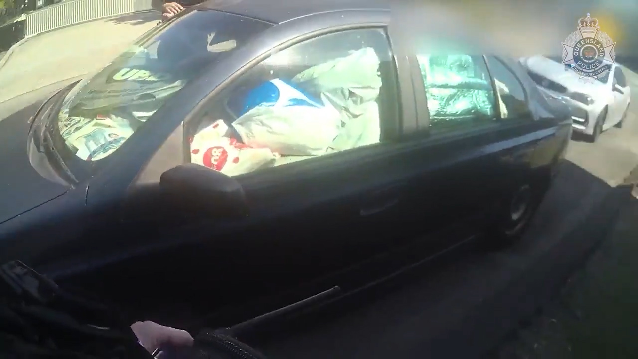News Queensland: Police pull over driver in car with windows blocked by ...