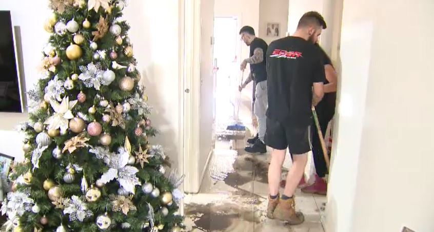 Heavy rain floods home, damaging presents as wild weather hits Victoria ...